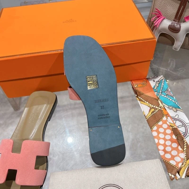 Indistinguishable Hermes Slippers