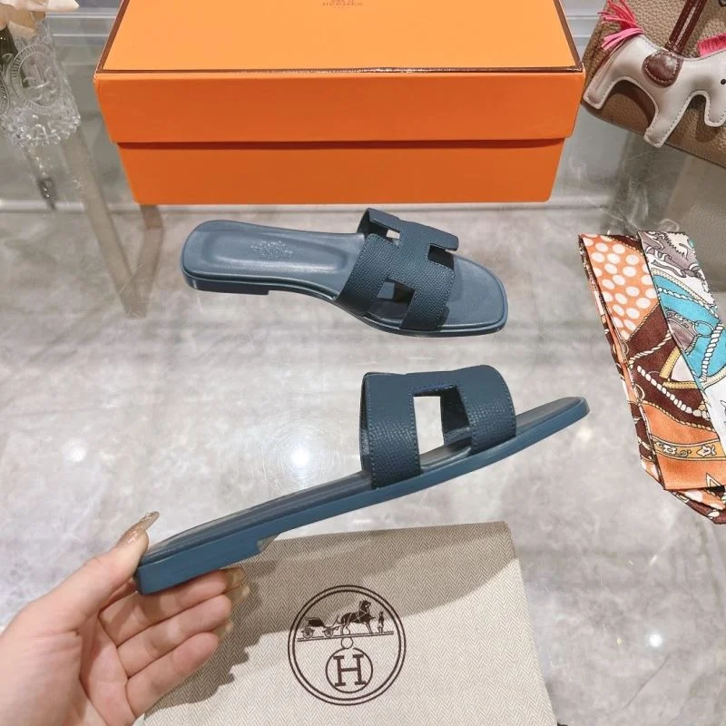 Indistinguishable Hermes Slippers