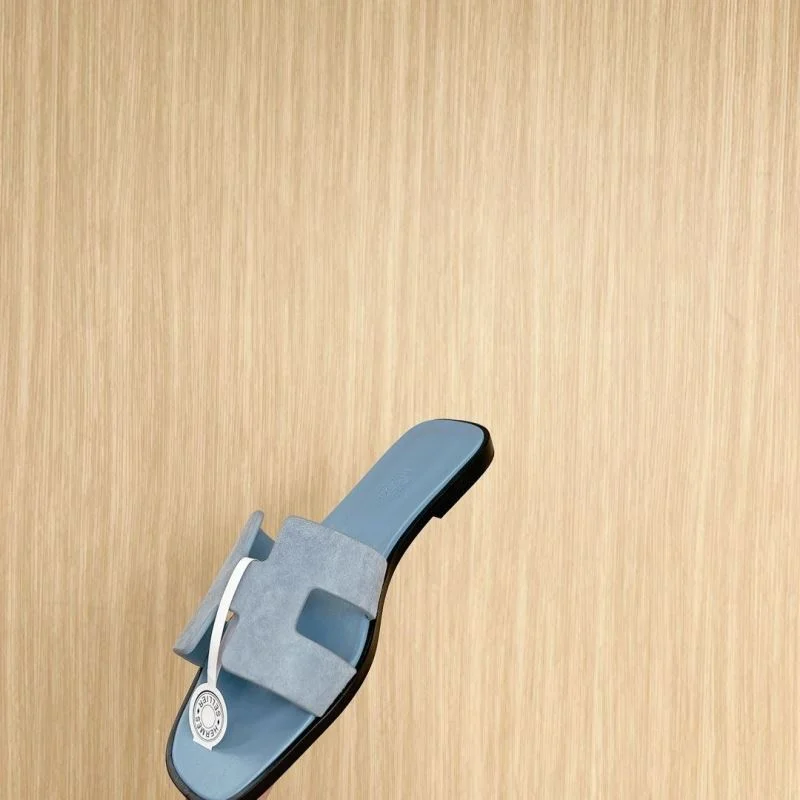 Value-priced Hermes Slippers