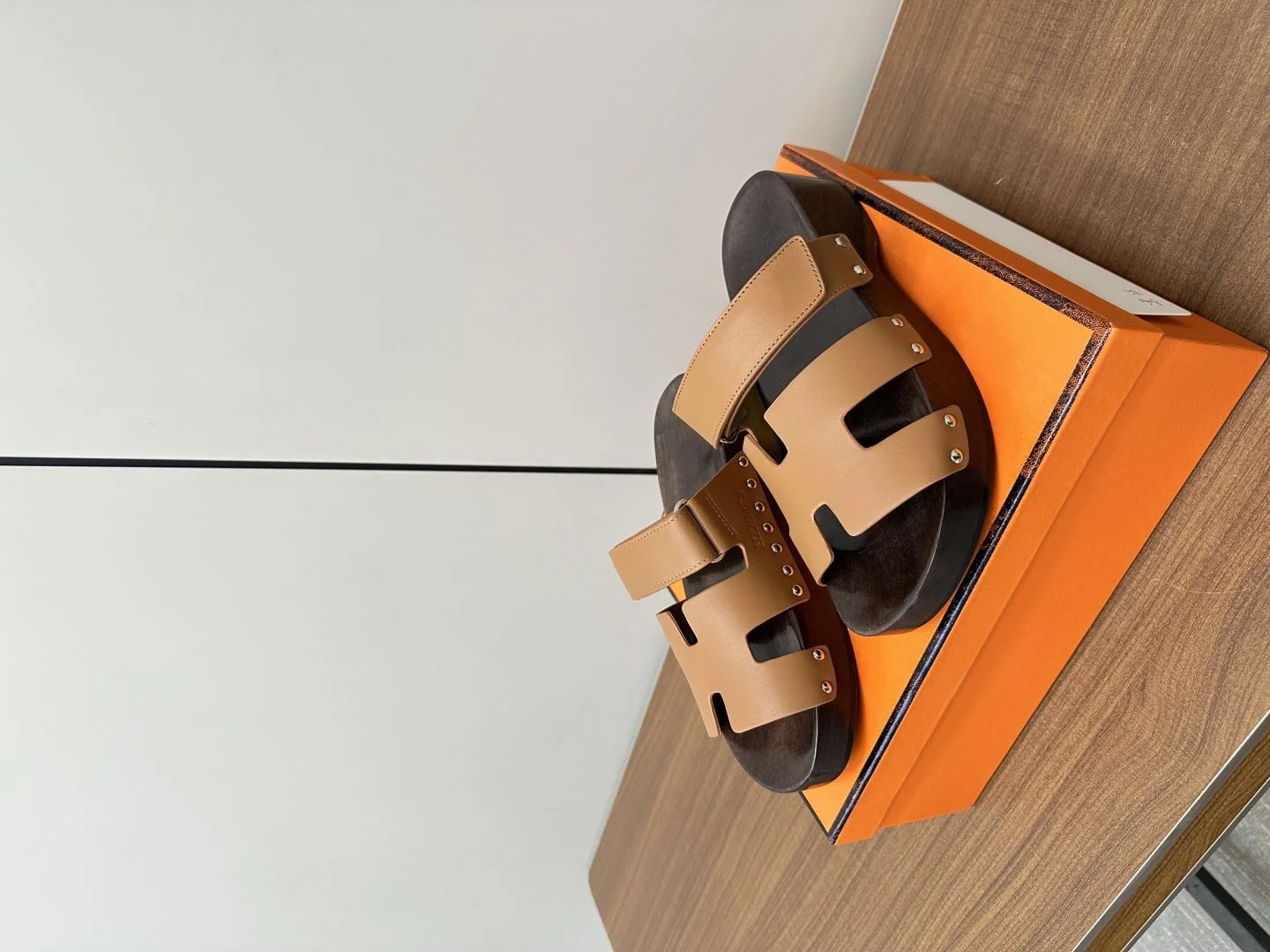 Indistinguishable Hermes Slippers