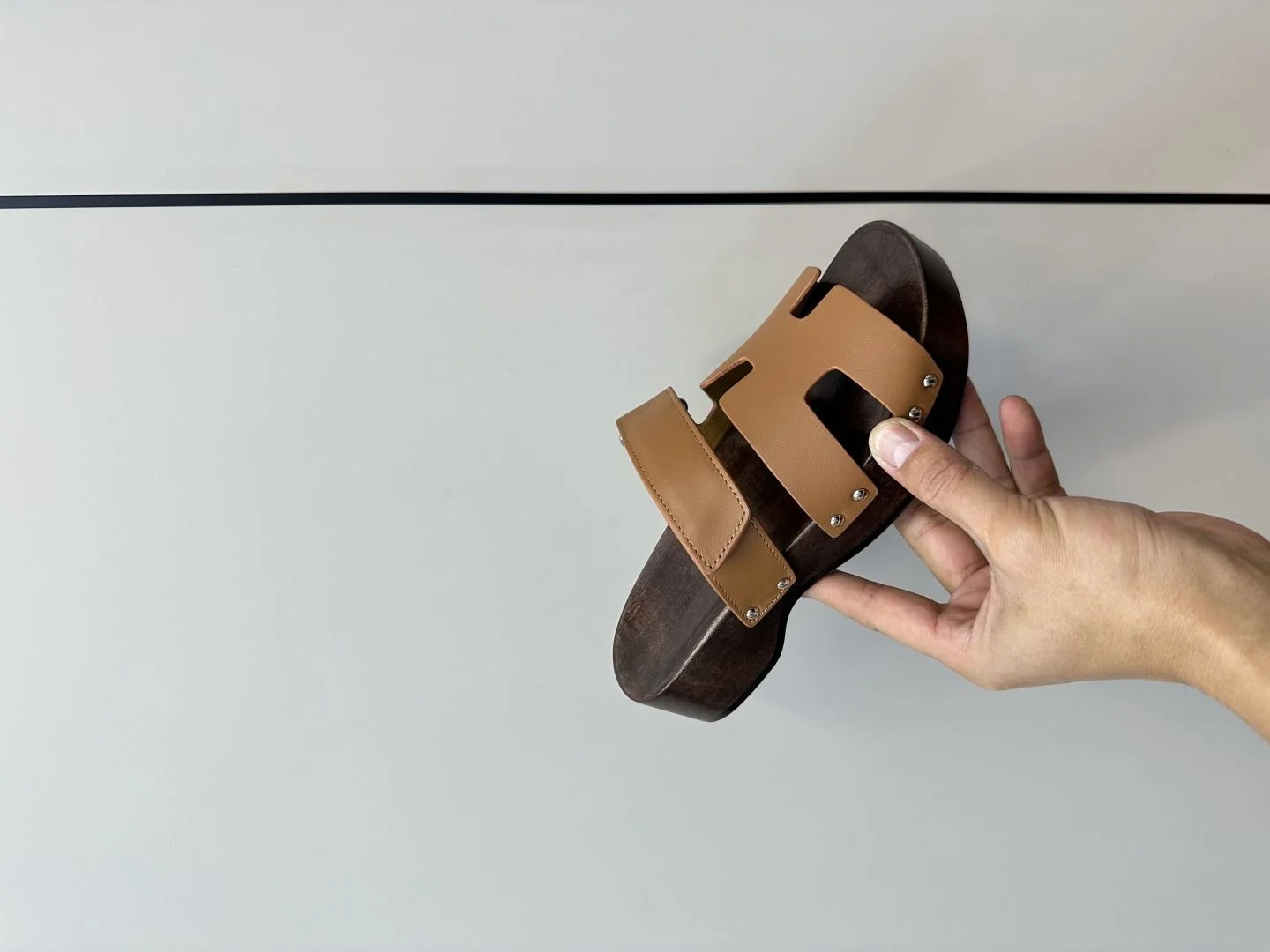 Indistinguishable Hermes Slippers