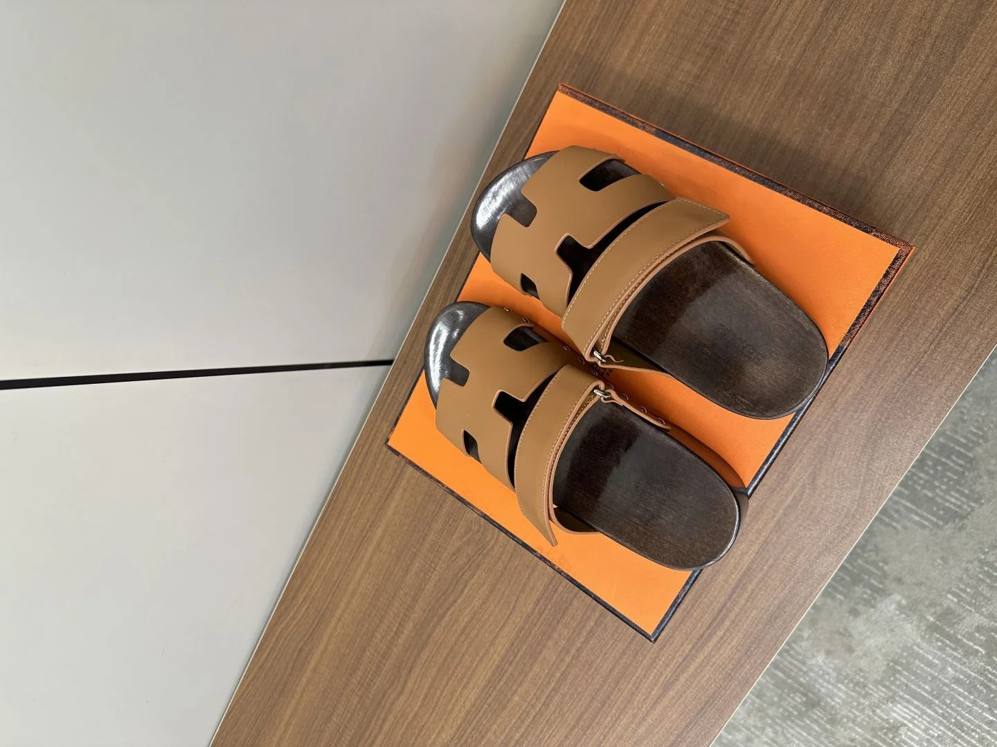 Indistinguishable Hermes Slippers