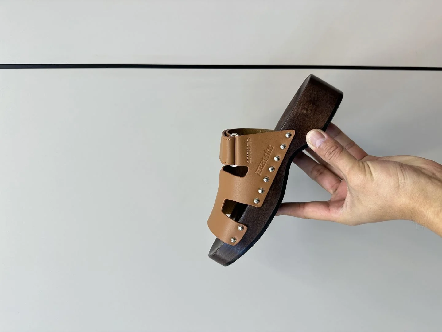 Indistinguishable Hermes Slippers