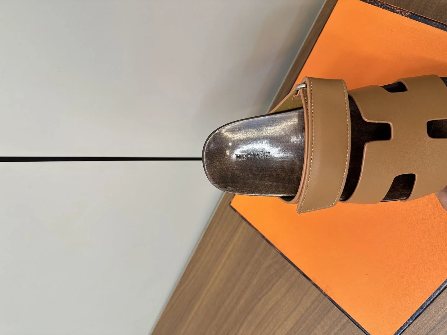 Indistinguishable Hermes Slippers