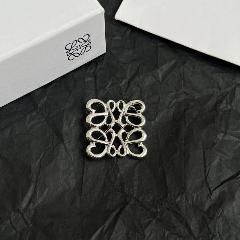 Indistinguishable Loewe Brooches