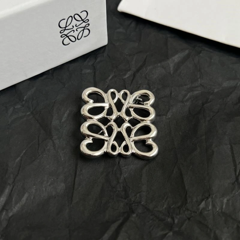 Indistinguishable Loewe Brooches