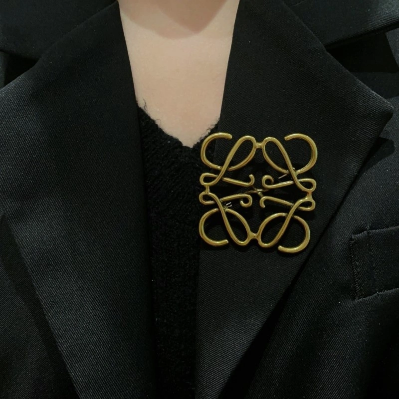 Indistinguishable Loewe Brooches