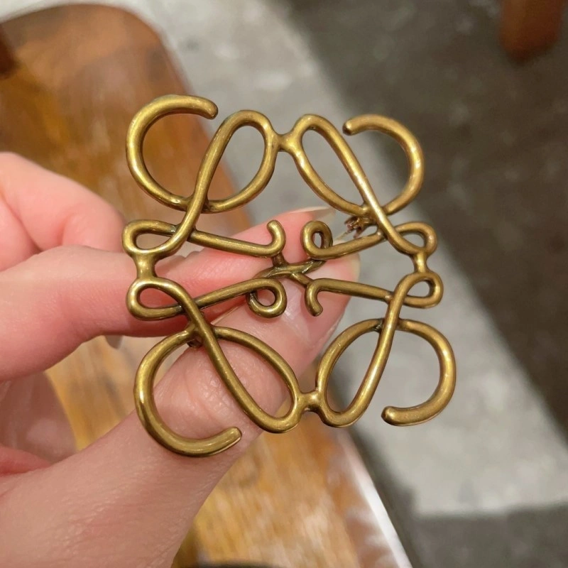 Indistinguishable Loewe Brooches