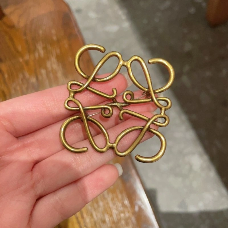 Indistinguishable Loewe Brooches