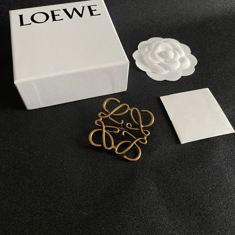 Indistinguishable Loewe Brooches