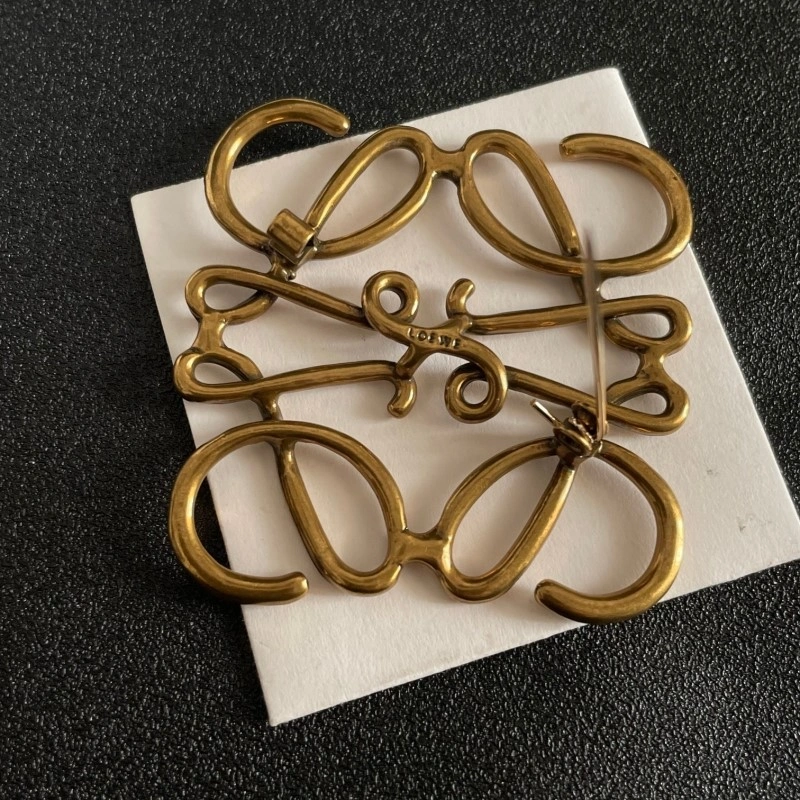 Indistinguishable Loewe Brooches