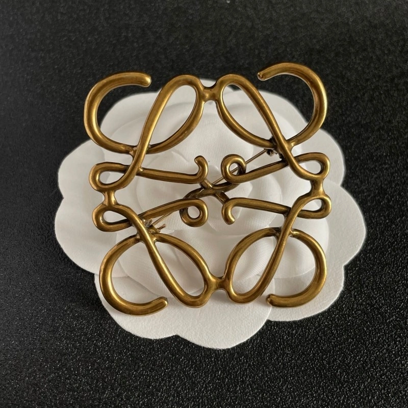Indistinguishable Loewe Brooches