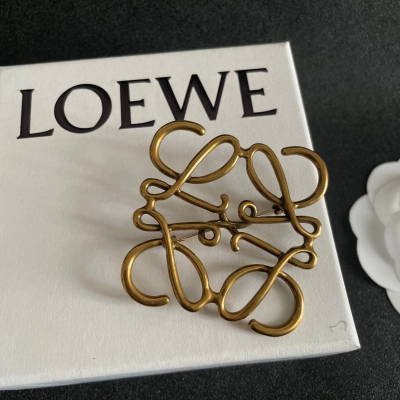 Indistinguishable Loewe Brooches