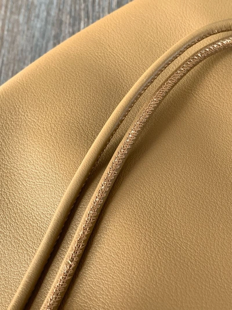 Indistinguishable Loewe Bucket Bags