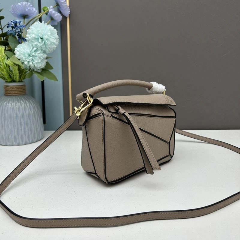 Indistinguishable Loewe Puzzle Bags
