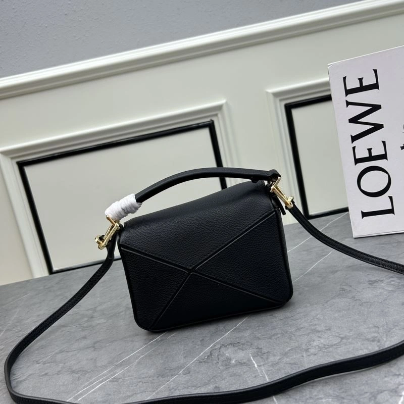 Indistinguishable Loewe Puzzle Bags