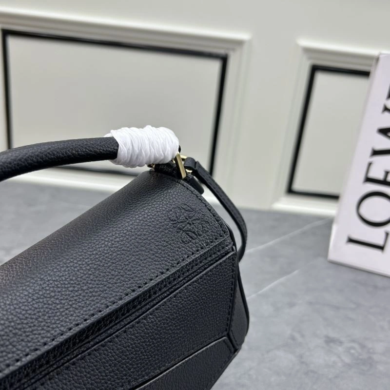 Indistinguishable Loewe Puzzle Bags