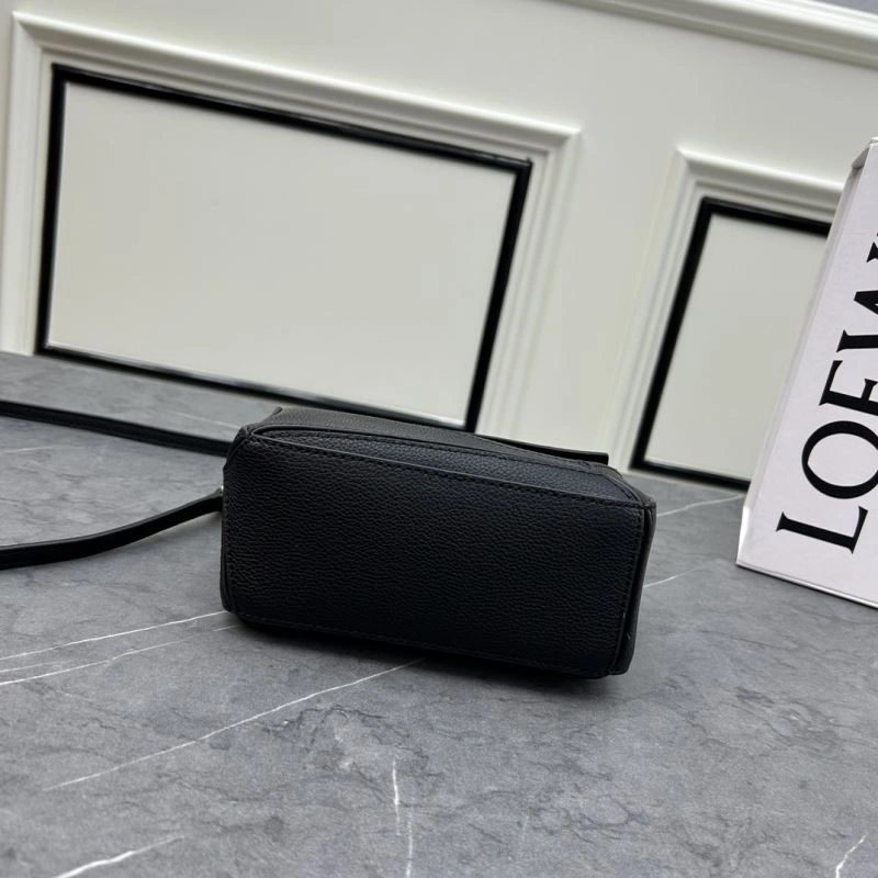 Indistinguishable Loewe Puzzle Bags