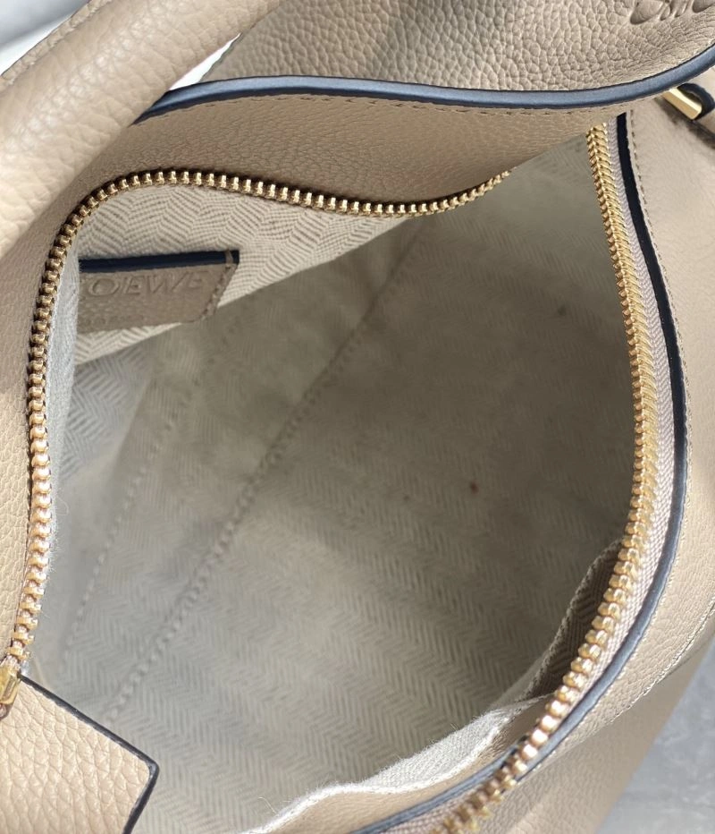 Indistinguishable Loewe Puzzle Bags