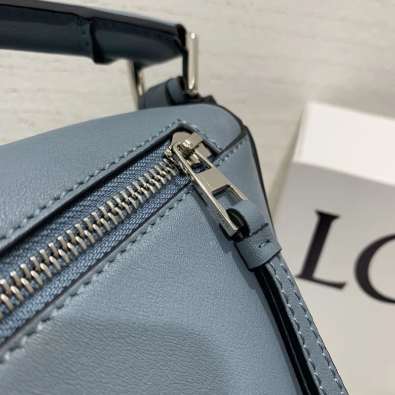 Low-cost Loewe Puzzle Bags