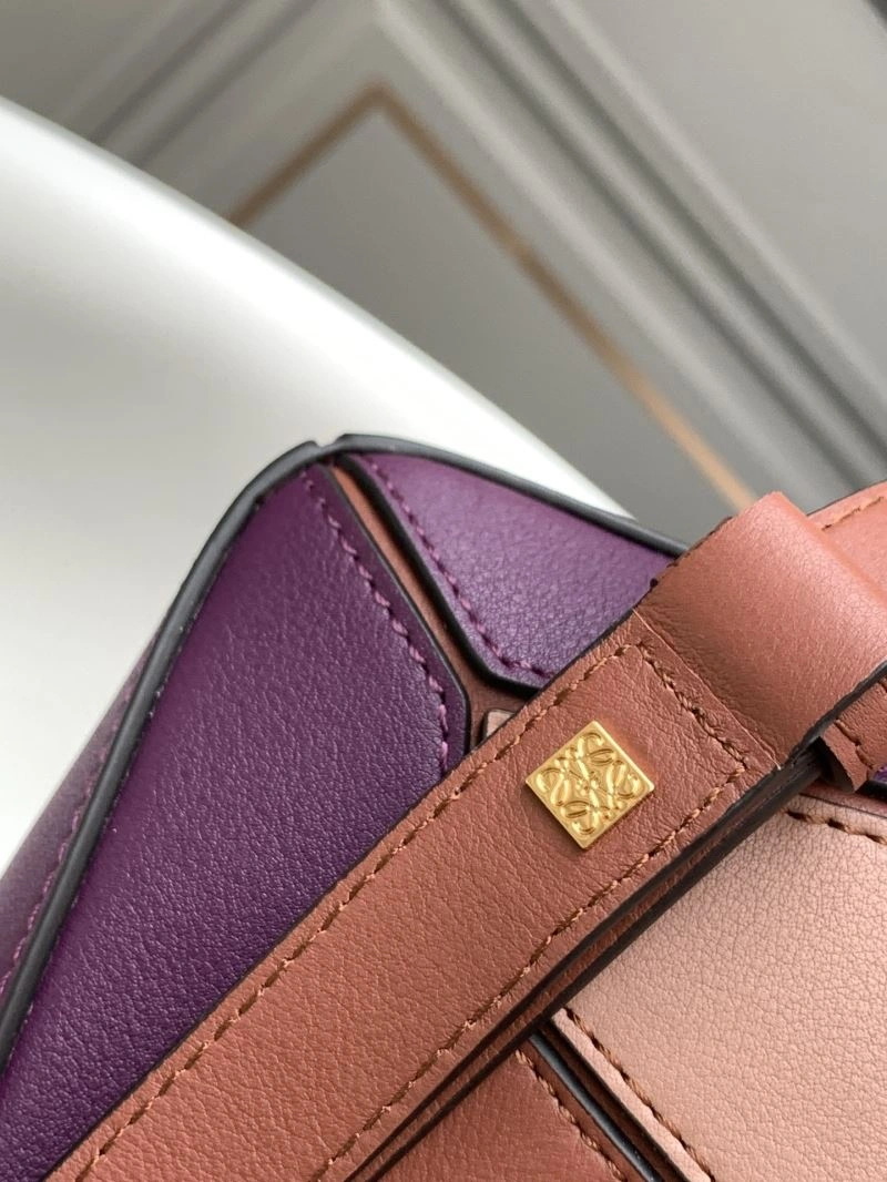 Indistinguishable Loewe Puzzle Bags
