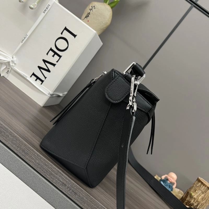 Low-cost Loewe Puzzle Bags