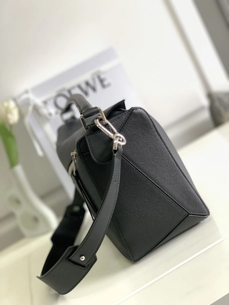 Indistinguishable Loewe Puzzle Bags