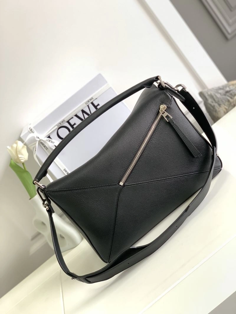 Indistinguishable Loewe Puzzle Bags