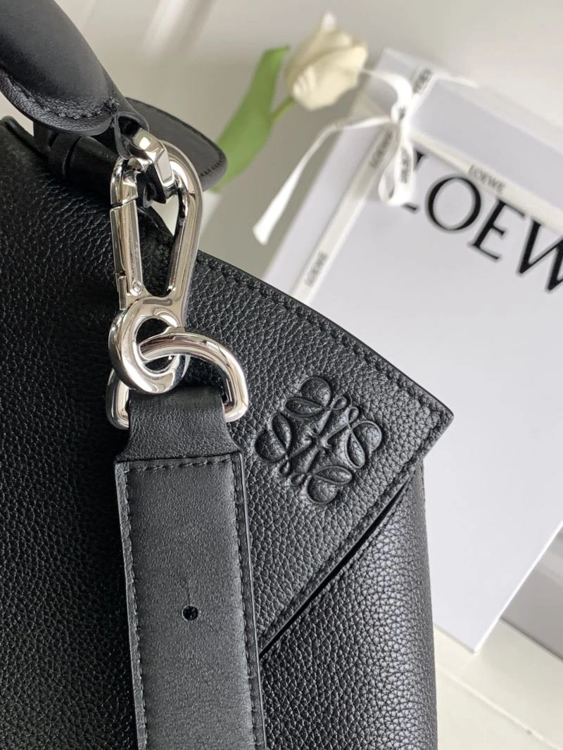 Indistinguishable Loewe Puzzle Bags