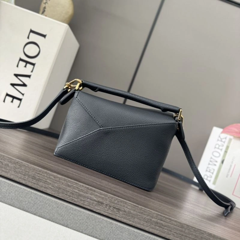 Indistinguishable Loewe Puzzle Bags