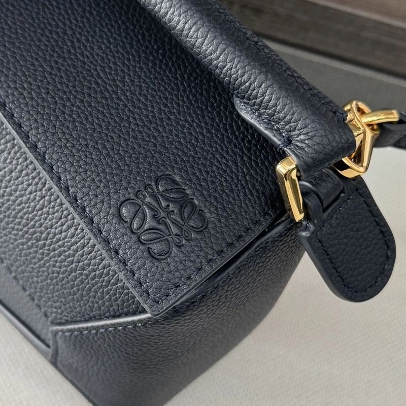 Indistinguishable Loewe Puzzle Bags