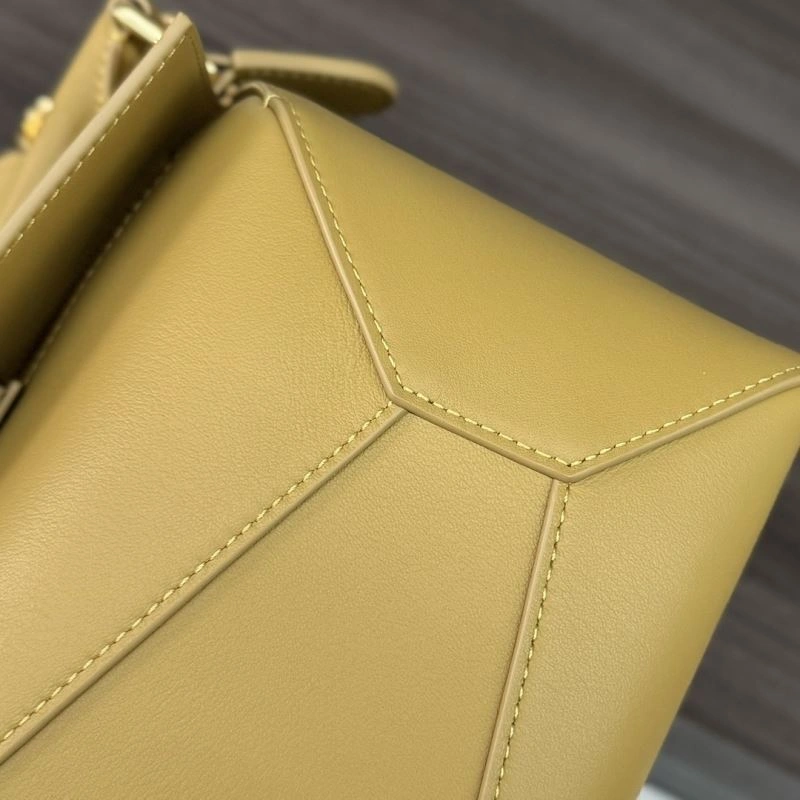 Indistinguishable Loewe Puzzle Bags