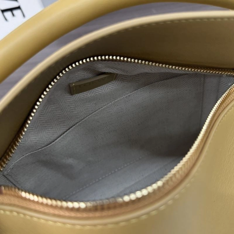 Indistinguishable Loewe Puzzle Bags