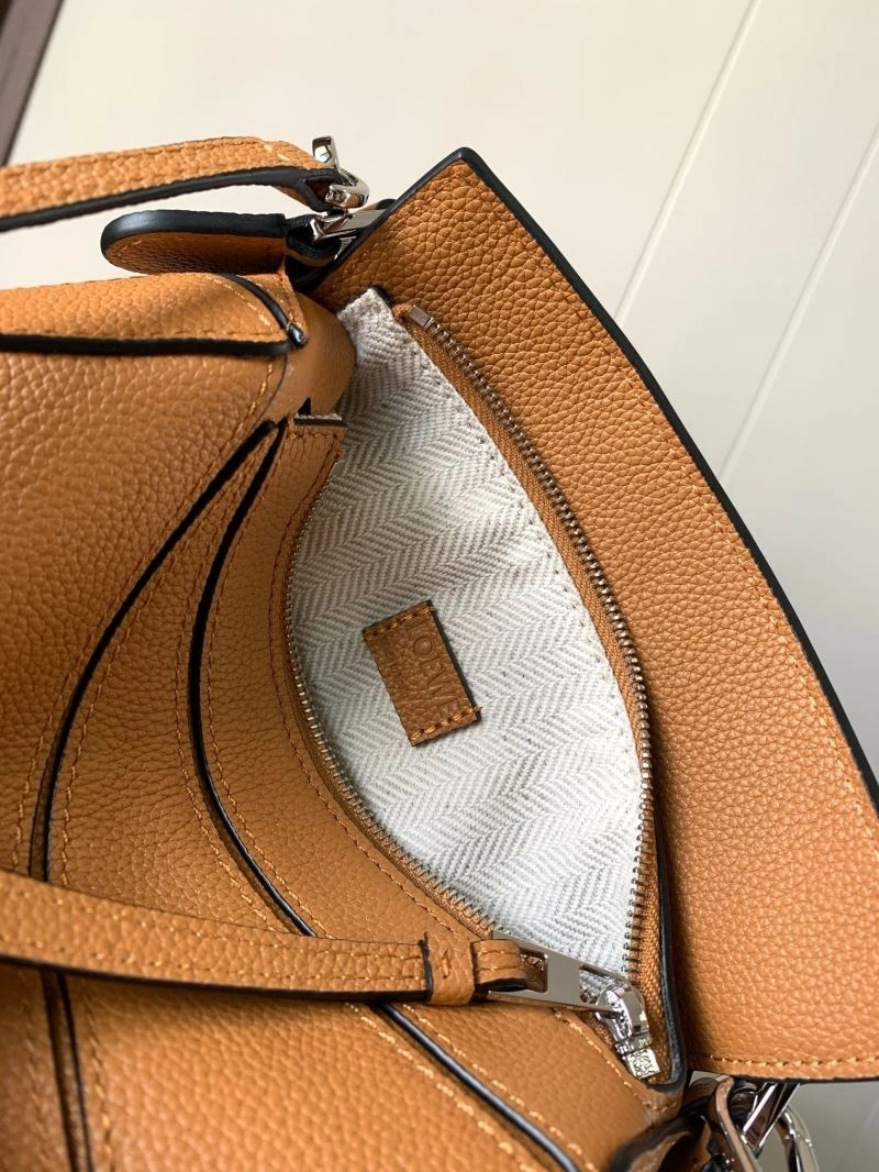 Indistinguishable Loewe Puzzle Bags