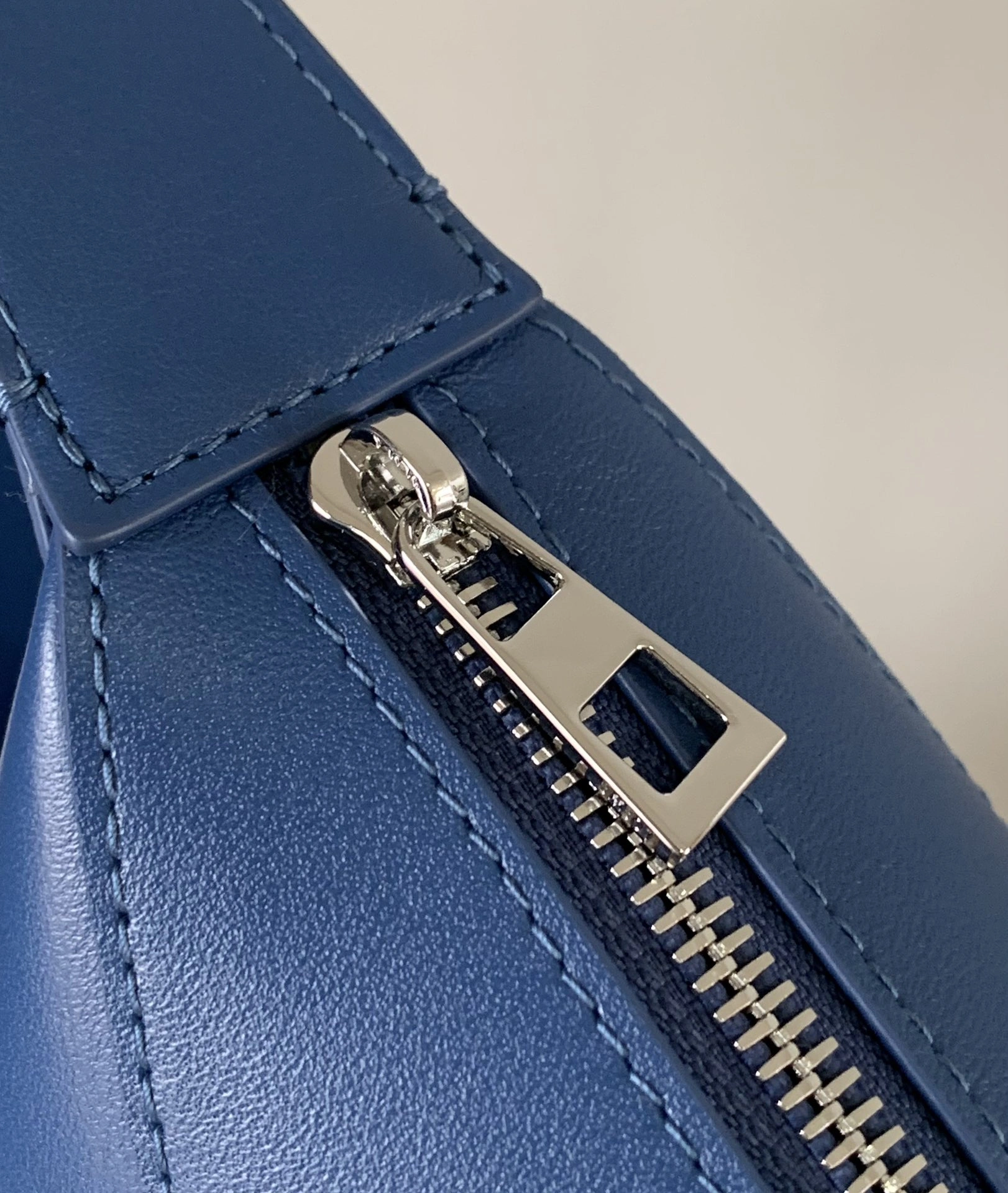 Indistinguishable Loewe Puzzle Bags