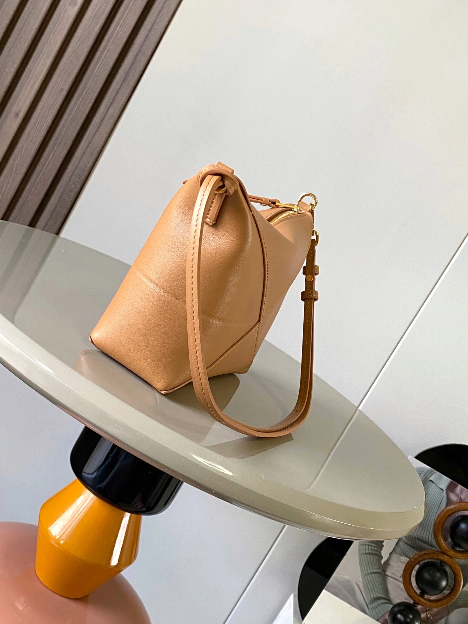 Indistinguishable Loewe Puzzle Bags