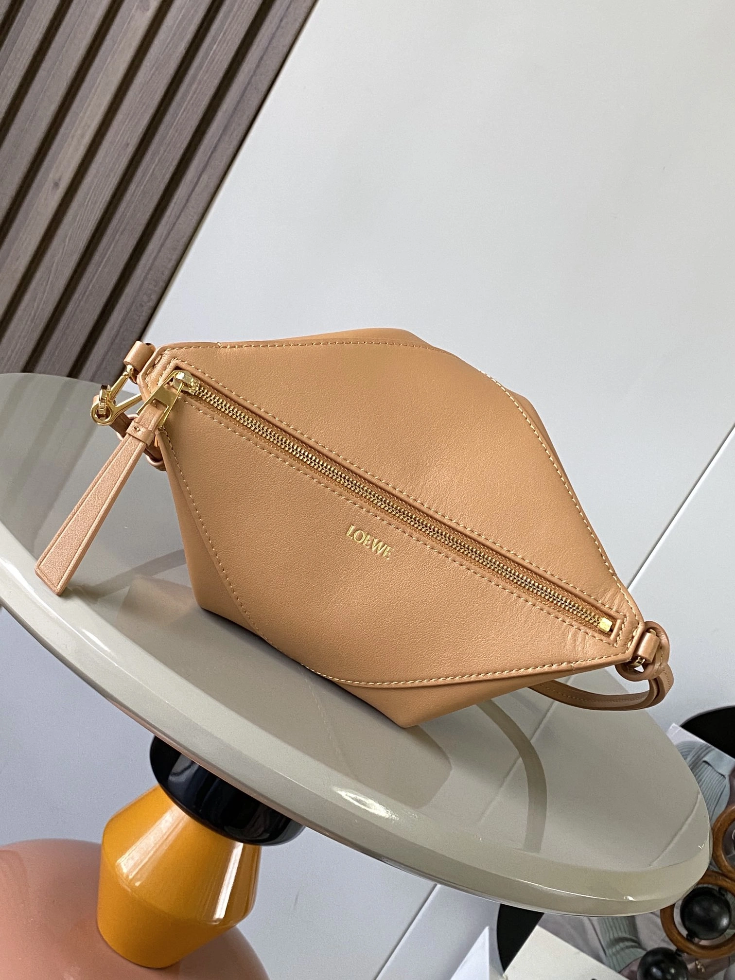 Indistinguishable Loewe Puzzle Bags