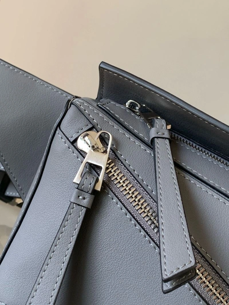 Low-cost Loewe Puzzle Bags