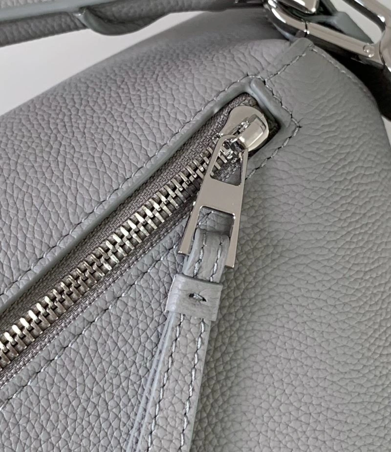 Indistinguishable Loewe Puzzle Bags