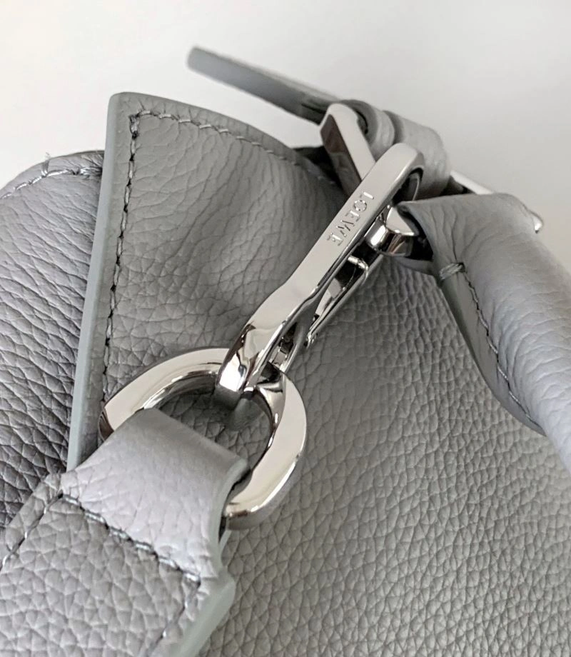 Indistinguishable Loewe Puzzle Bags