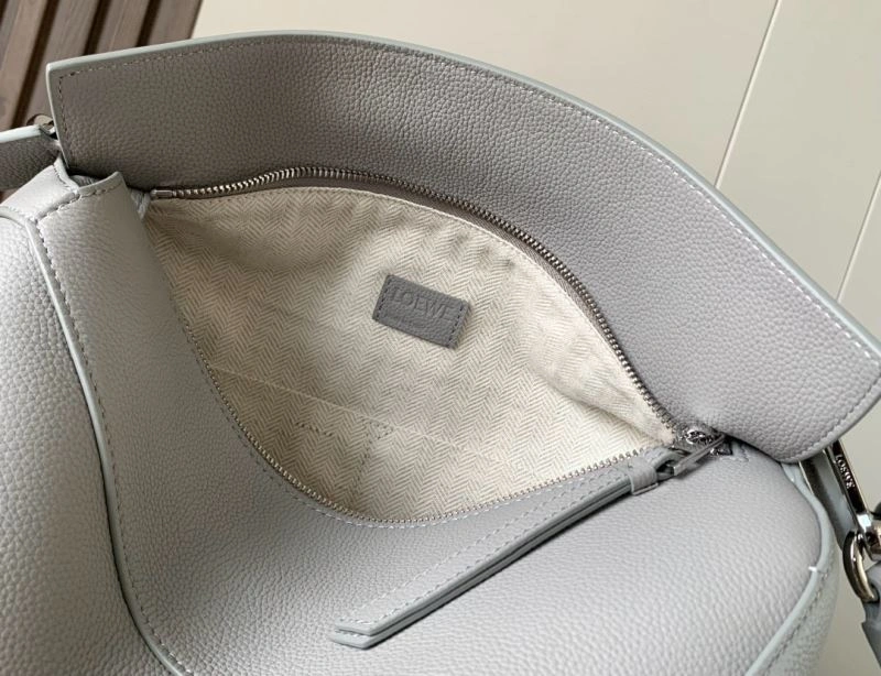 Indistinguishable Loewe Puzzle Bags