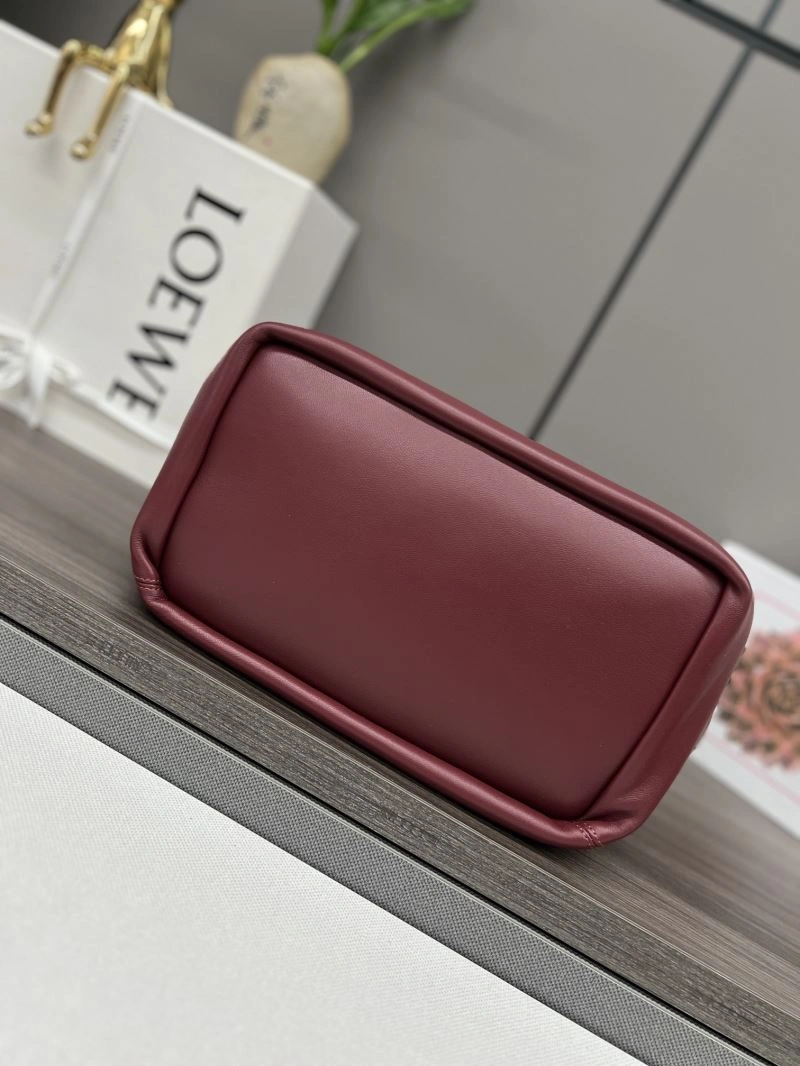 Indistinguishable Loewe Top Handle Bags