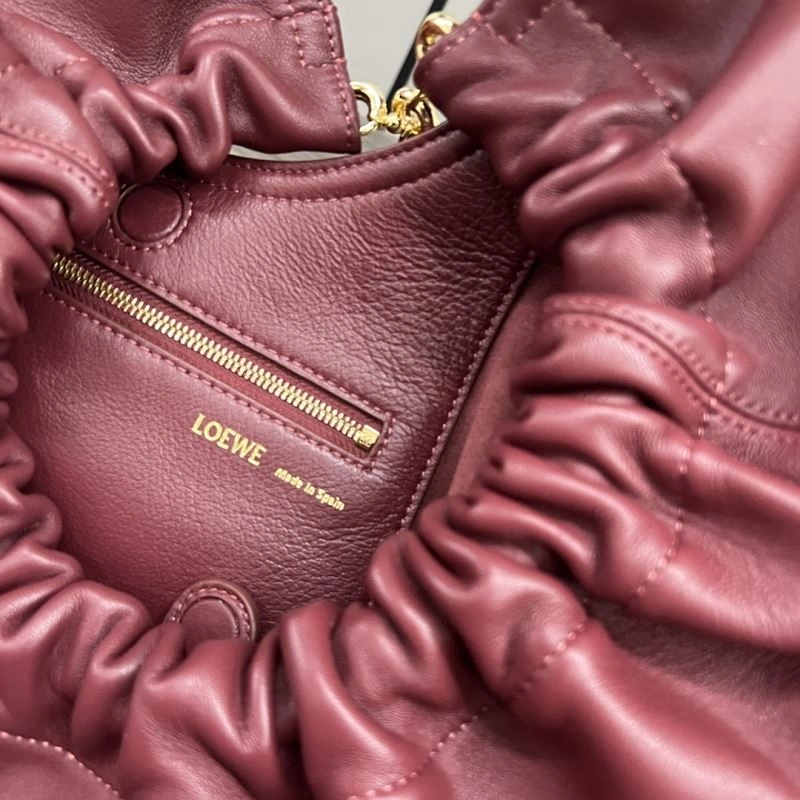 Indistinguishable Loewe Top Handle Bags