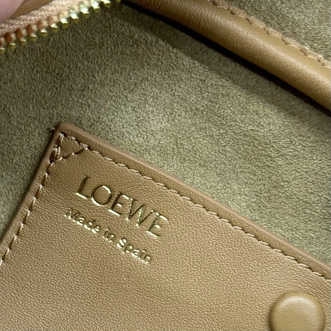 Indistinguishable Loewe Top Handle Bags