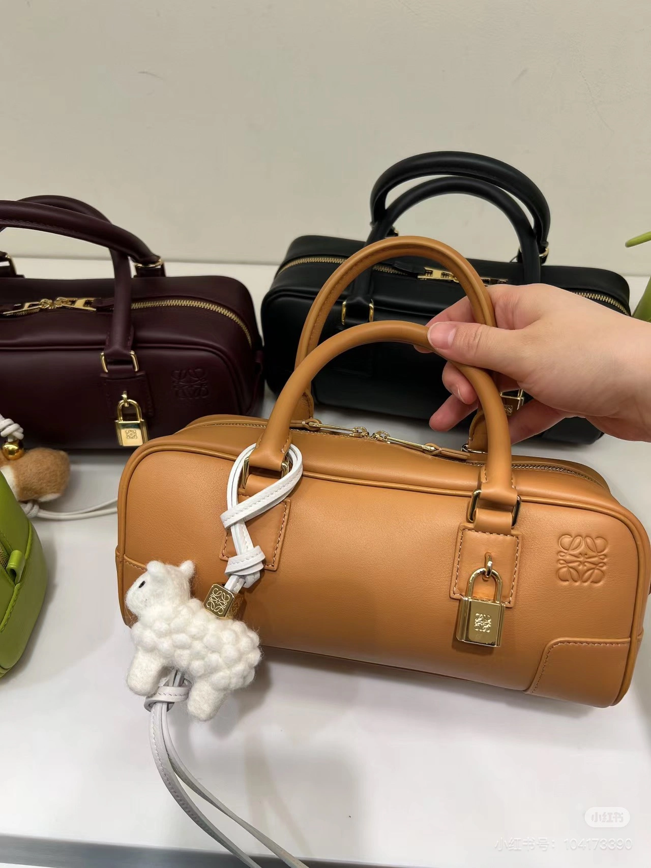 Indistinguishable Loewe Top Handle Bags