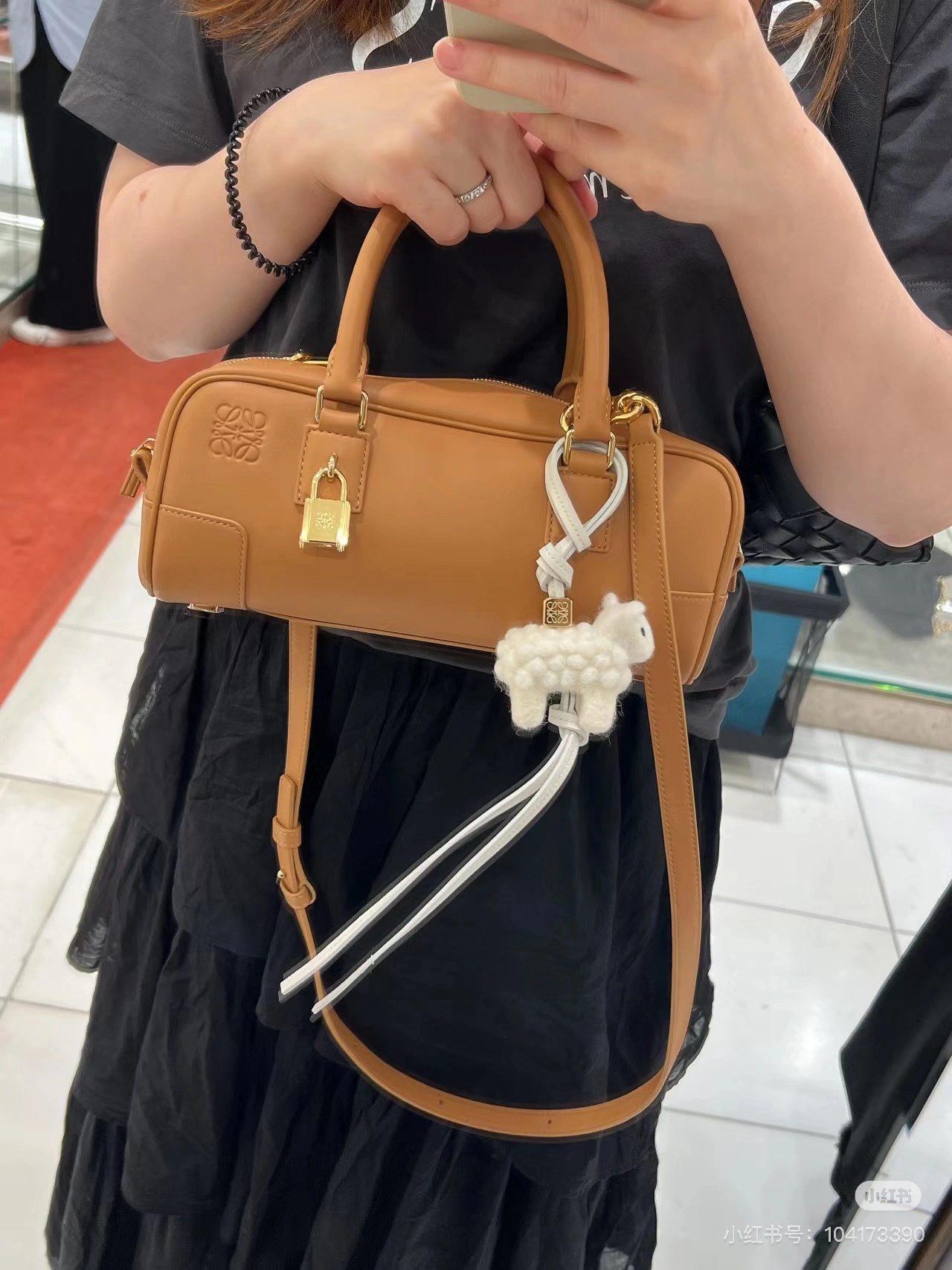 Indistinguishable Loewe Top Handle Bags