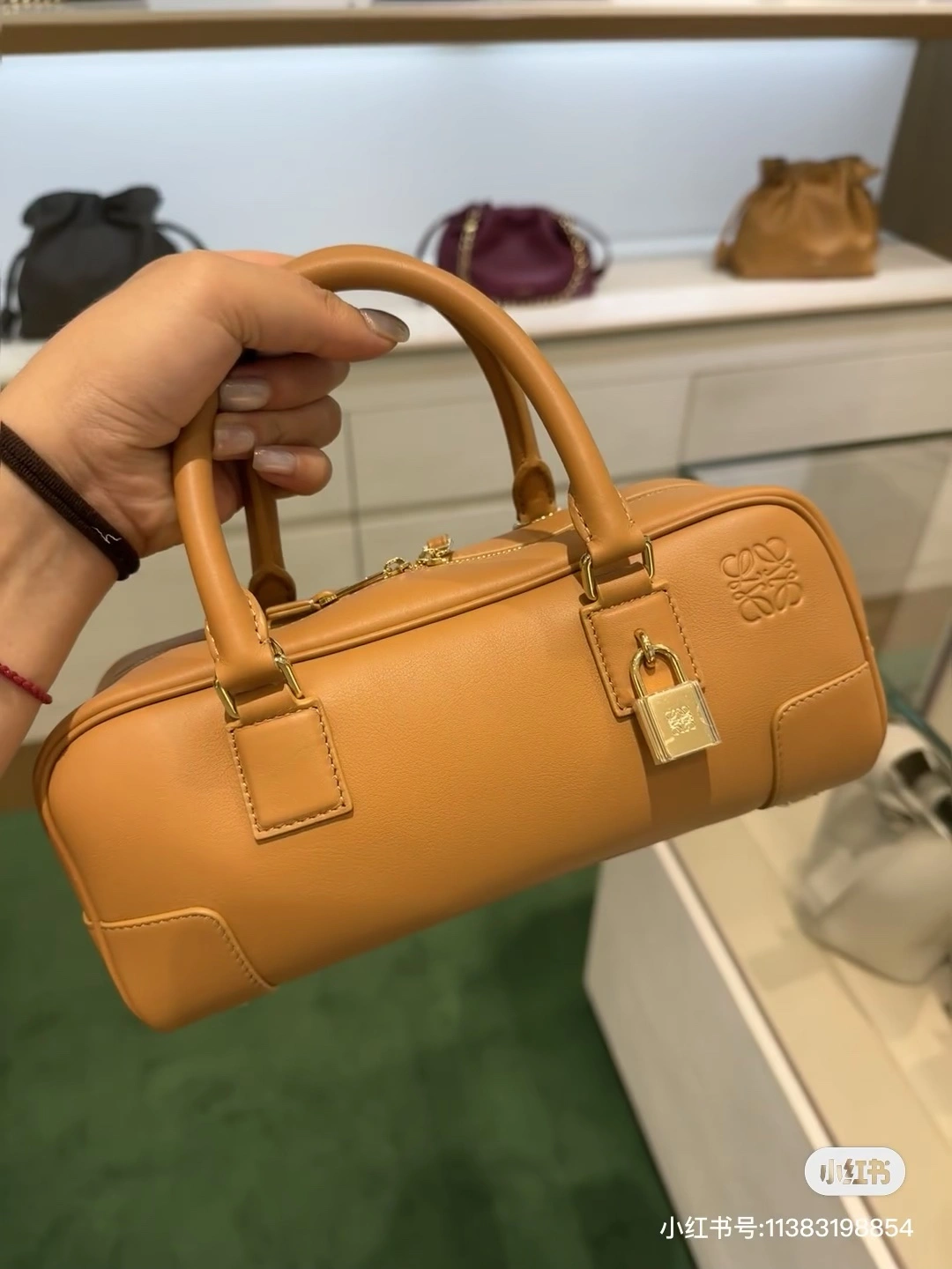 Indistinguishable Loewe Top Handle Bags