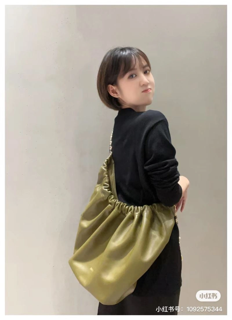 Indistinguishable Loewe Top Handle Bags