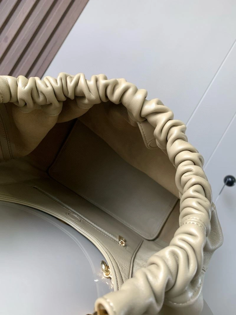 Indistinguishable Loewe Top Handle Bags