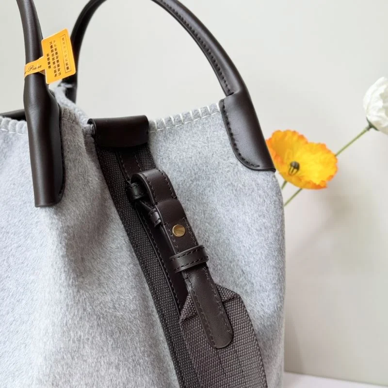 Value-priced Loro Piana Bucket Bags